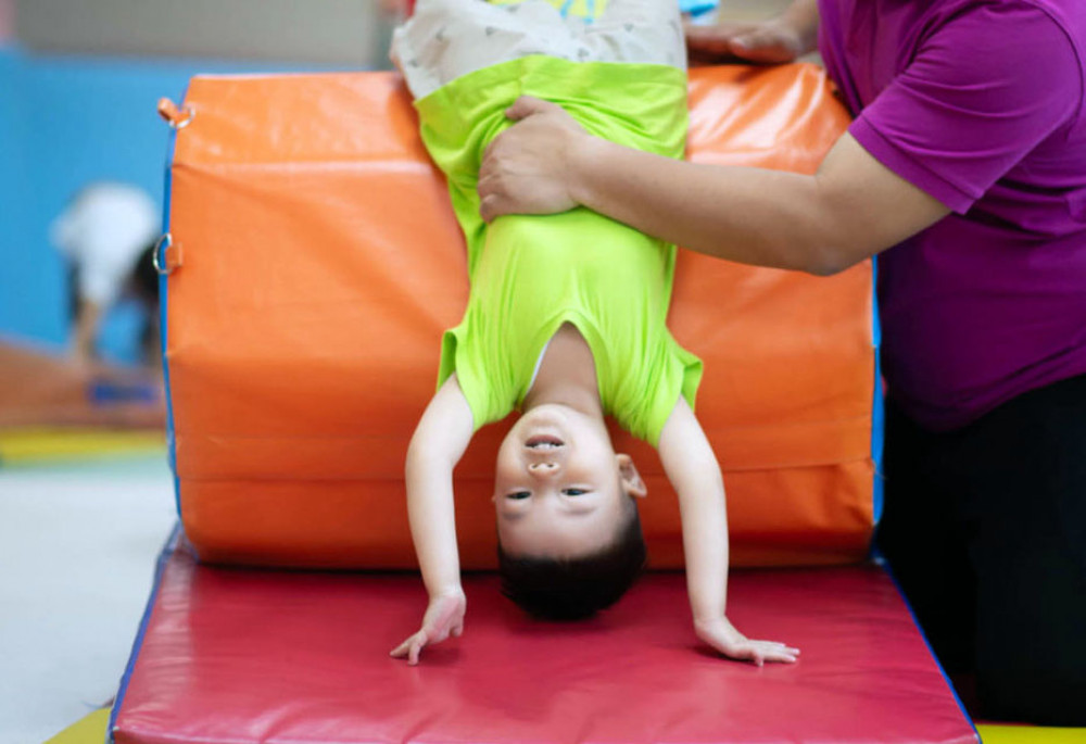Gymnastics program designed to strengthen kids' muscle control ...