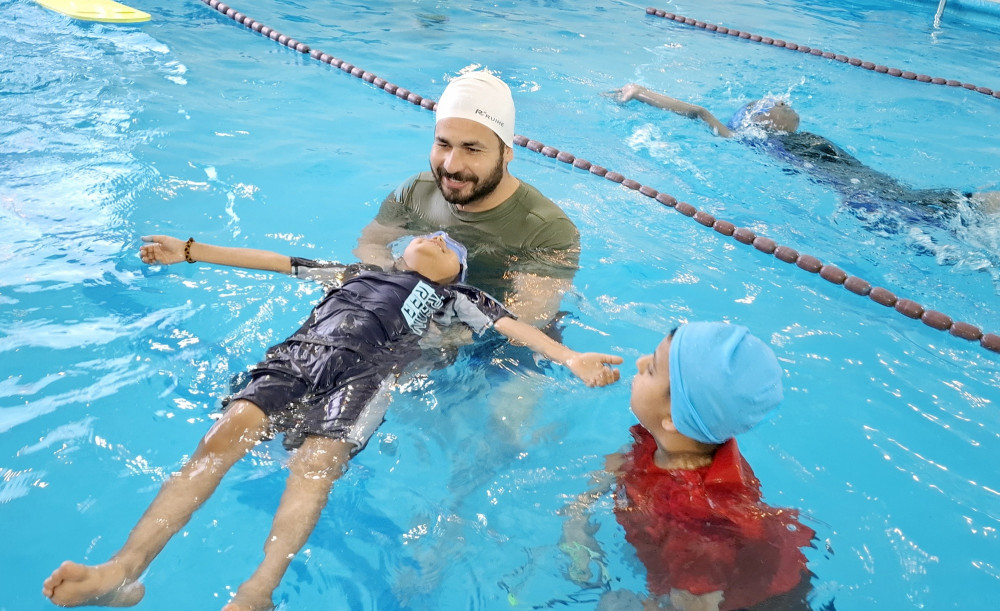 How to Stand on Water Surface Essential Kids’ Swimming Skill | Fit Box ...