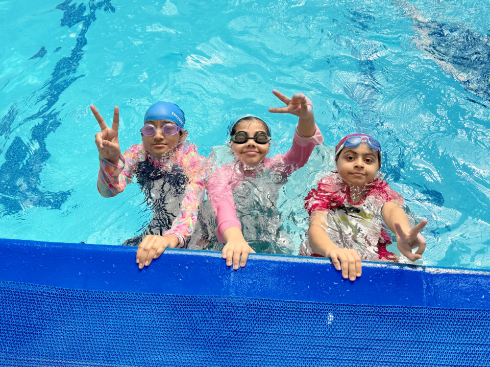 Girls Swimming Together with Joyful Movement | Fit Box Center